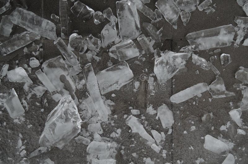 Debris of Crushed Icicles on a Concrete Floor Background Stock Image ...