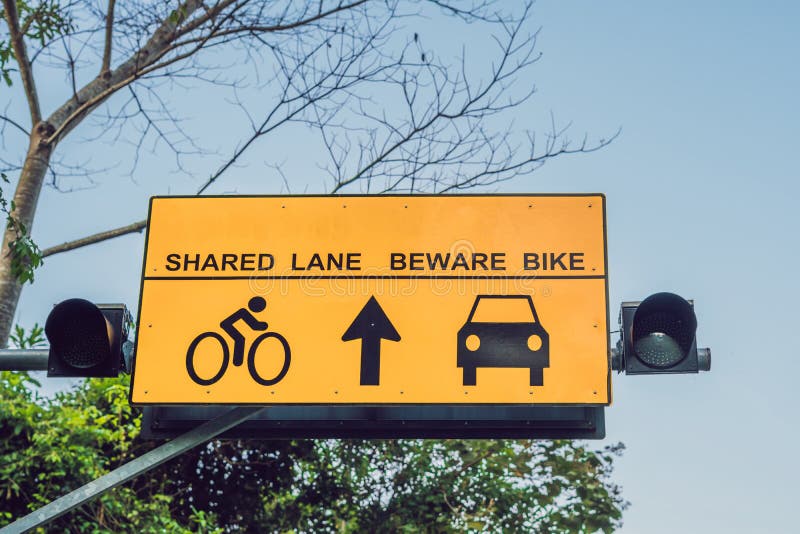 Shared Lane and Beware Bike Warning Sign Stock Image - Image of ride ...