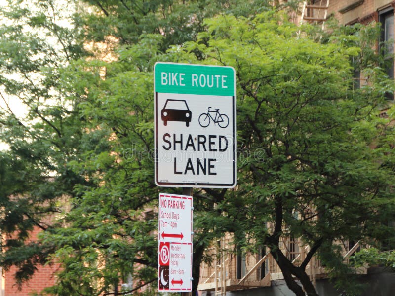 Shared Lane and Beware Bike Warning Sign Stock Image - Image of ride ...