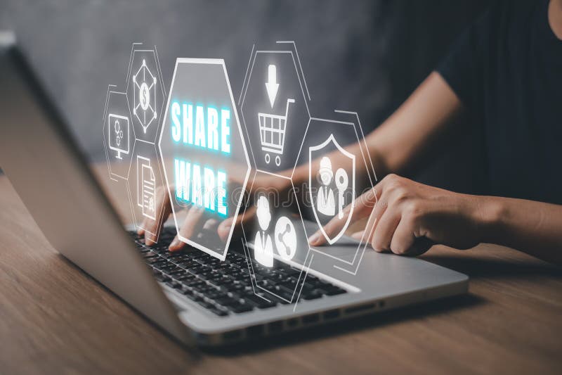 Person Working on Laptop Computer on Desk with DevOps Icon on Virtual ...
