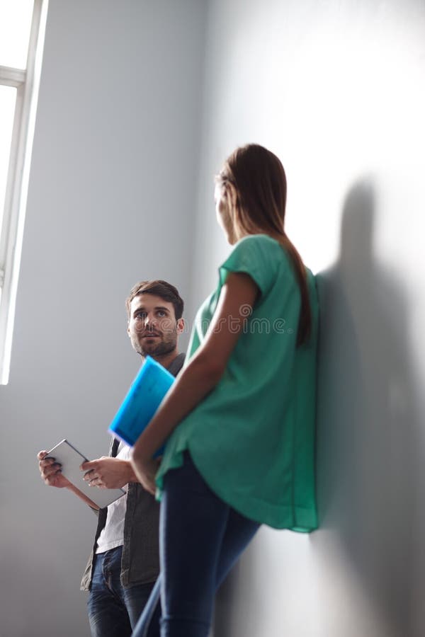 Sharing Ideas for Future Business. Low Angle Shot of Two People Having ...