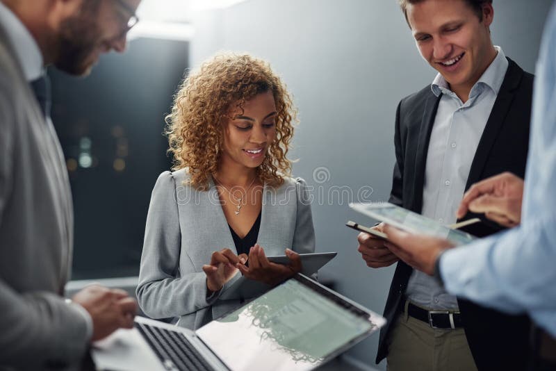 Were in this Together. a Group of Businesspeople Joining Their Hands ...