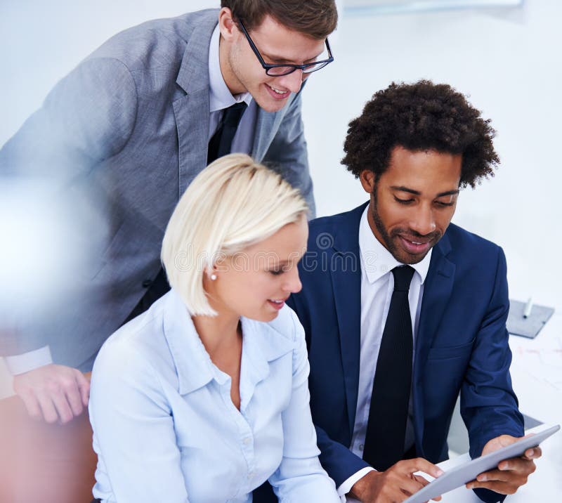 Sharing the Latest Digital Updates. a Group of Businesspeople Looking ...