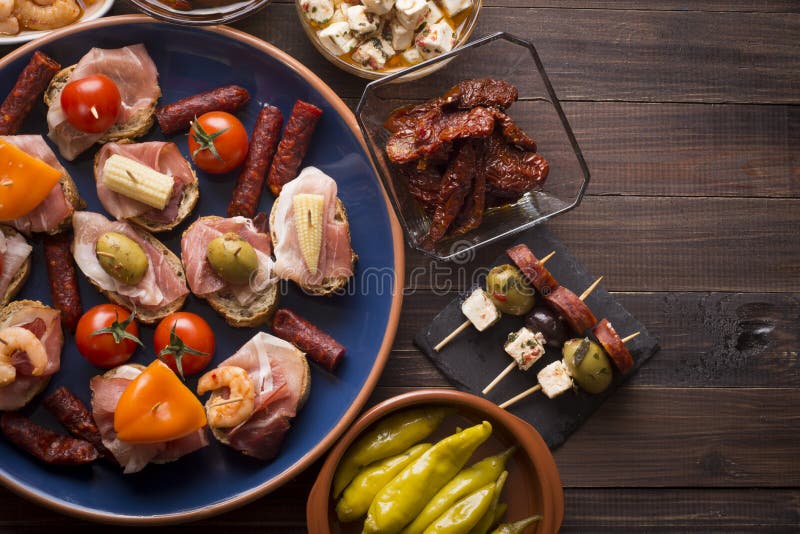 Spanish tapas on table stock image. Image of food, meat - 105544593