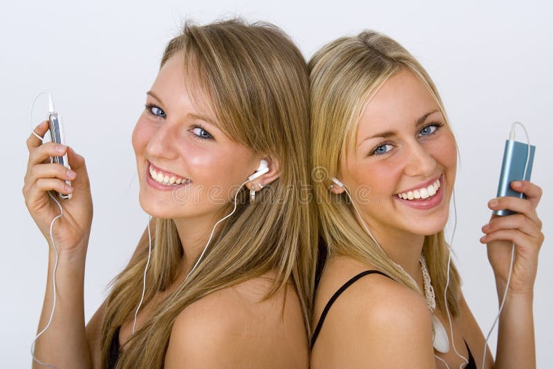 Sharing Music stock photo. Image of players, eyes, headphones - 1898346