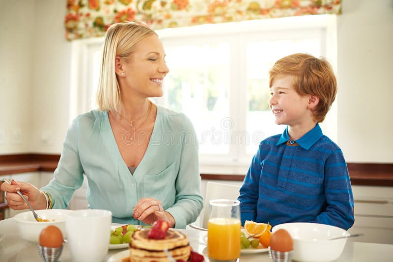 Sharing a Nutritious and Delicious Breakfast Together. a Mother and Son ...