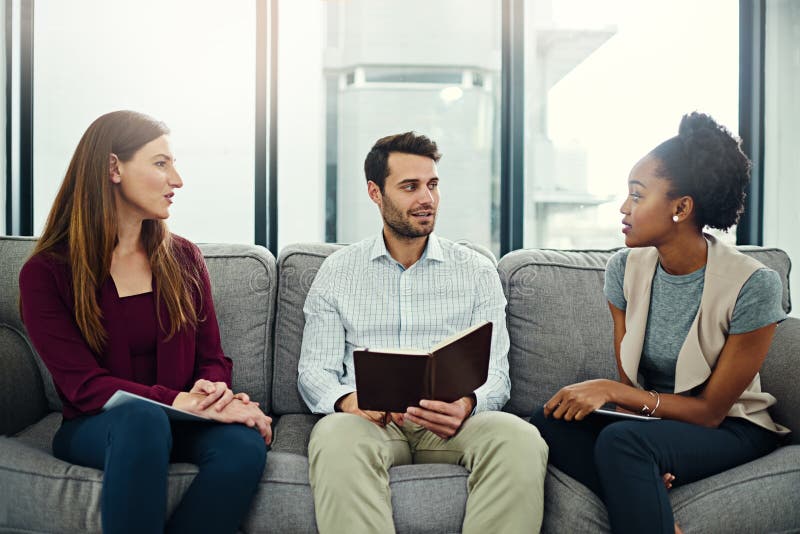 Sharing Updates with the Team. a Group of Colleagues Having a ...