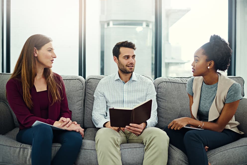 Sharing Updates with the Team. a Group of Colleagues Having a ...