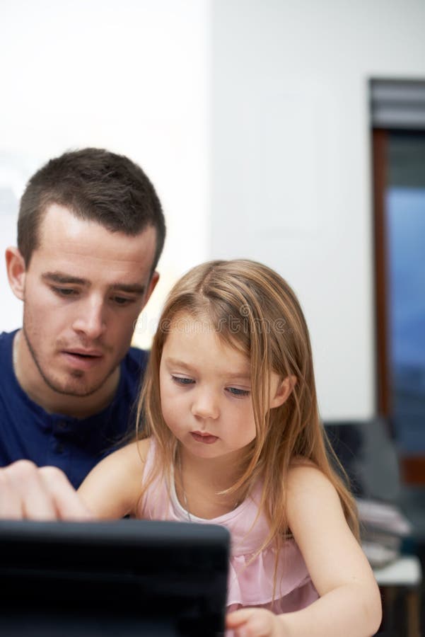 Sharing the Wonders of Technology with Her. a Father Teaching His ...