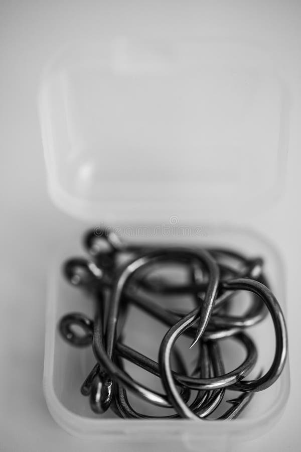 Sharp Big Fishing Hooks are in a Box on a White Background Stock Photo ...