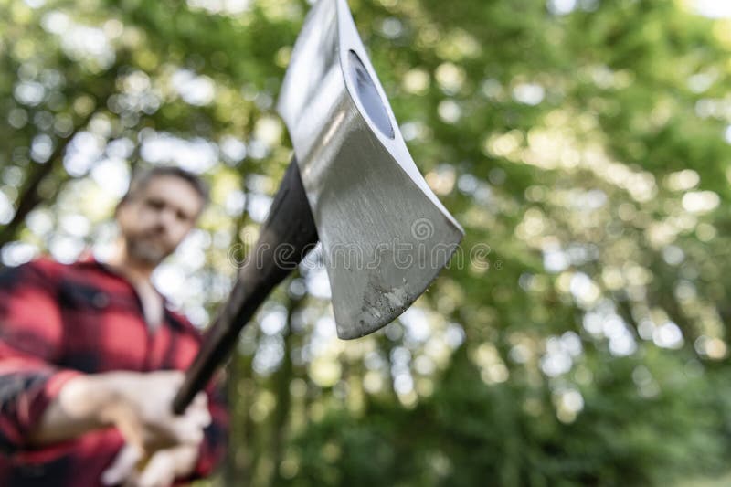 Sharp Blade. Brutality and Masculinity. Lumberjack with Ax Selective ...