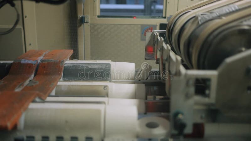 Sharp Blade Cuts Paper Rolls on Conveyor Line at Paper Mill. Stock ...