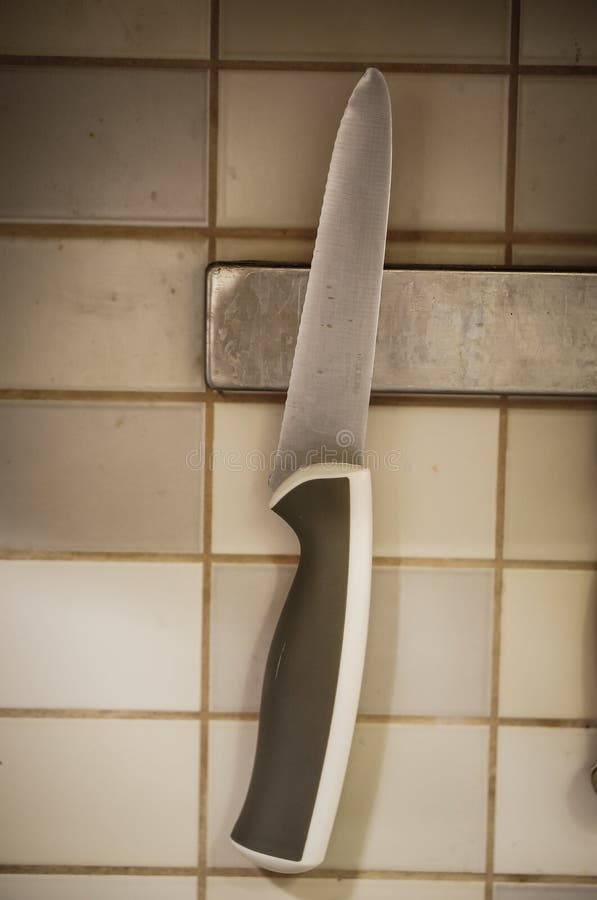 Kitchen Knife Hanging on a Wall Stock Photo - Image of sharp, equipment ...