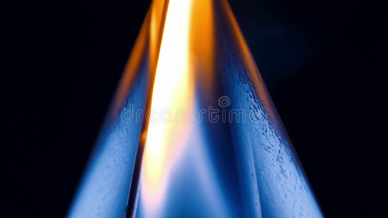 The Sharp Clear Edges of the Flame Appear As a Perfect Triangle ...