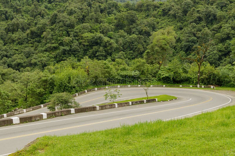 Sharp Curve on a Mountain Route Surrounded by Vegetation Stock Photo ...