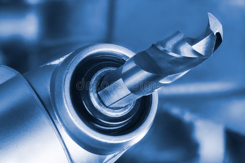 Sharp Drill Bit Clamped in Machine Chuck with Right Angle Head in Blue ...