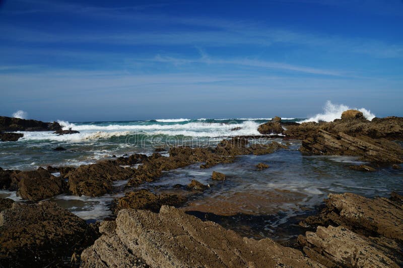 Sharp Edged Tilted Lava Rock Layers Exposed at Low Tide Stock Image ...