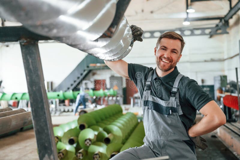 Sharp Edges of Equipment. Man in Uniform is in Workstation Developing ...