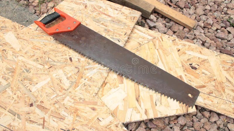 Sharp Hacksaw and Wooden Plate Stock Video - Video of edge, board: 96794387