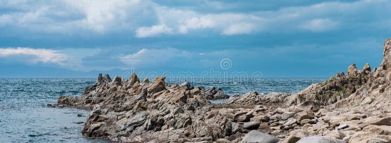 Sharp Jagged Basalt Rocks on the Sea Coast Stock Image - Image of ...