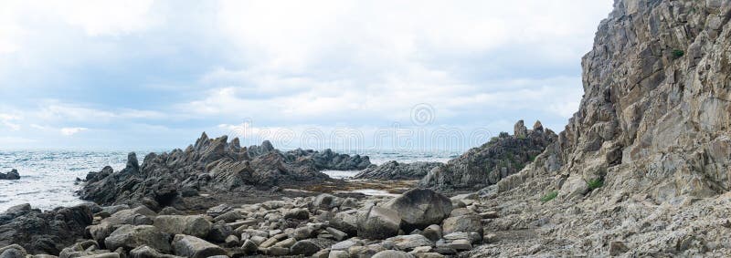 Sharp Jagged Basalt Rocks on the Sea Coast Stock Illustration ...