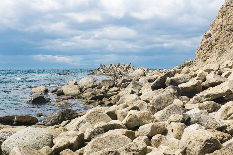 Sharp Jagged Basalt Rocks on the Sea Coast, Cape Stolbchaty on Kunashir ...