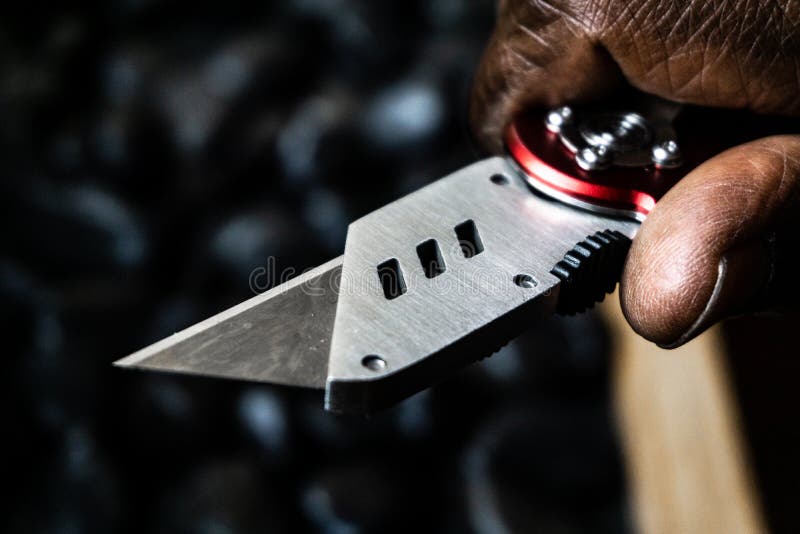 Sharp Knife Blade Being Held Out in an Old Man& X27;s Hand. Stock Photo ...