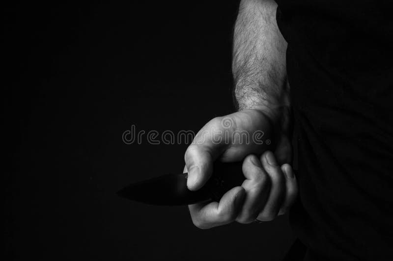 A Sharp Knife in the Man& X27;s Hand. the Use of Cold Weapons. Knife ...