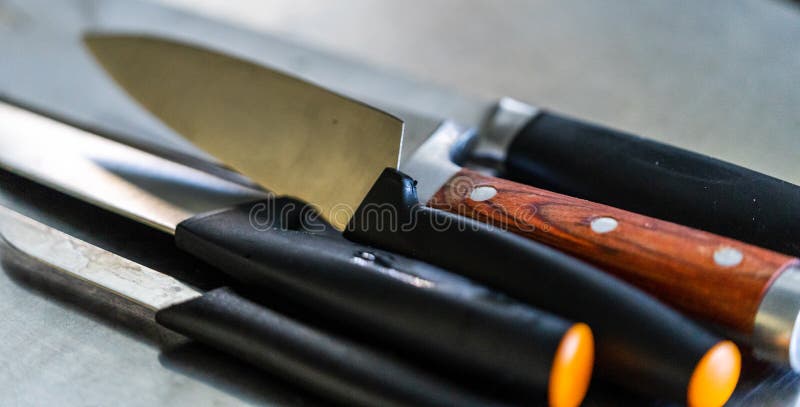 Sharp Knive with Black Handles Laying on Table Stock Image - Image of ...