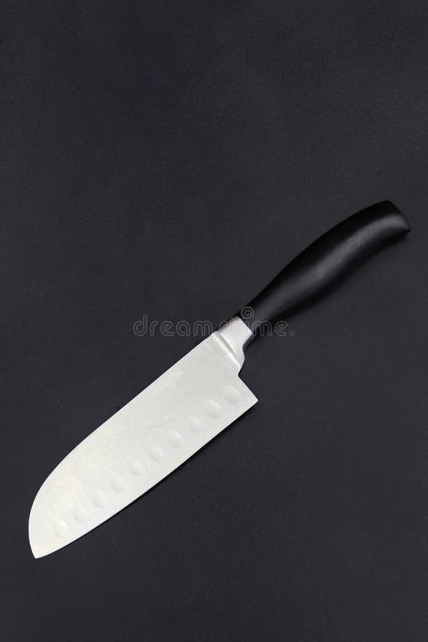 Sharp Large Kitchen Knife on a Dark Surface Stock Photo - Image of ...