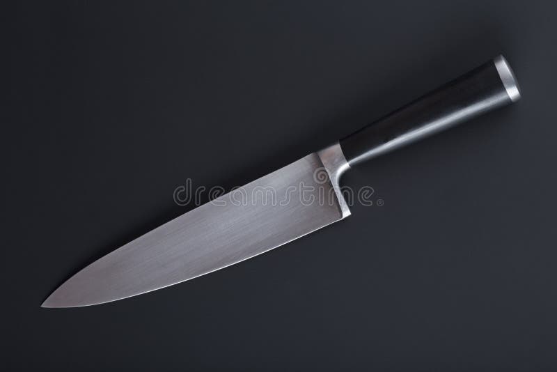 Sharp Large Kitchen Knife on a Dark Surface. Stock Image - Image of ...