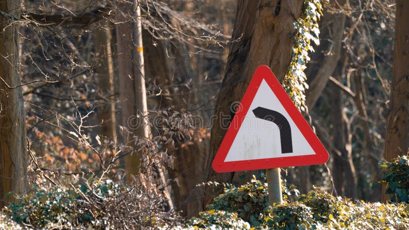 Sharp Left Turn Sign stock photo. Image of curves, metaphors - 507156