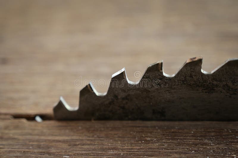Sharp Metal Saw on Wood Plank Texture Background, Construction Machine ...