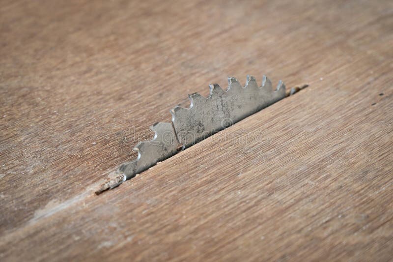 Sharp Metal Saw on Wood Plank Texture Background, Construction Machine ...