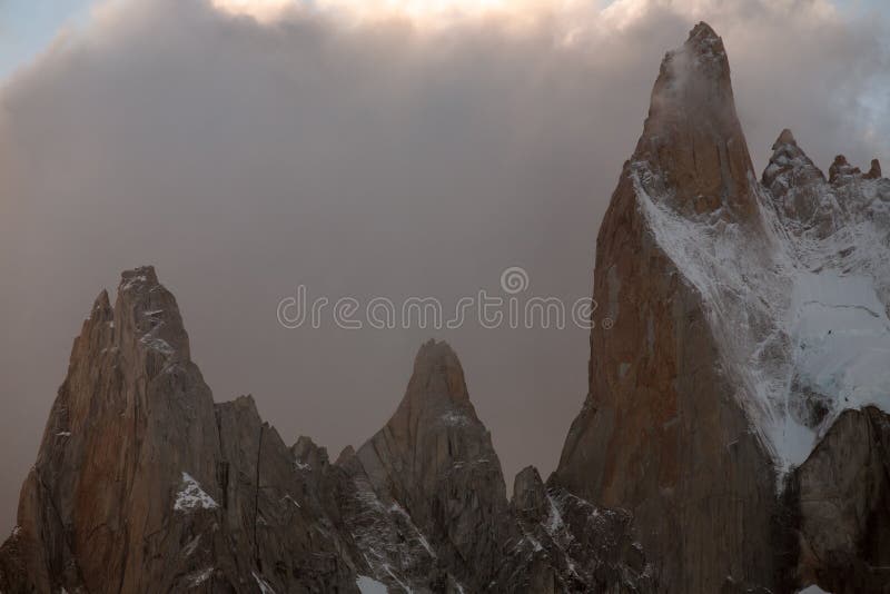 Sharp Mountain Peaks in the Clouds. Stock Photo - Image of clouds, mist ...