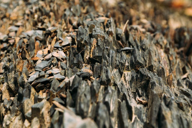 Sharp Mountain Rocks by the River. Many Layers of Stone Stock Photo ...
