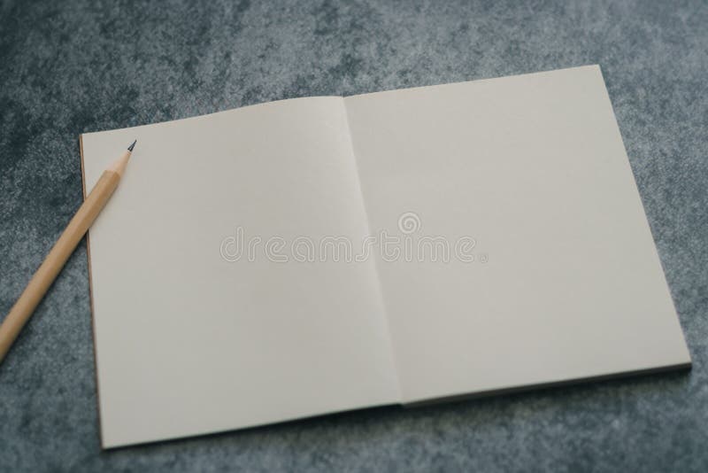 Sharp Pencil and Plain Notebook on Black Background with Copy Space ...