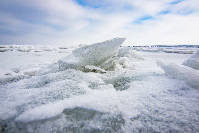 Sharp Piece of Ice Lying on the Snow in Sunny Weather Stock Photo ...