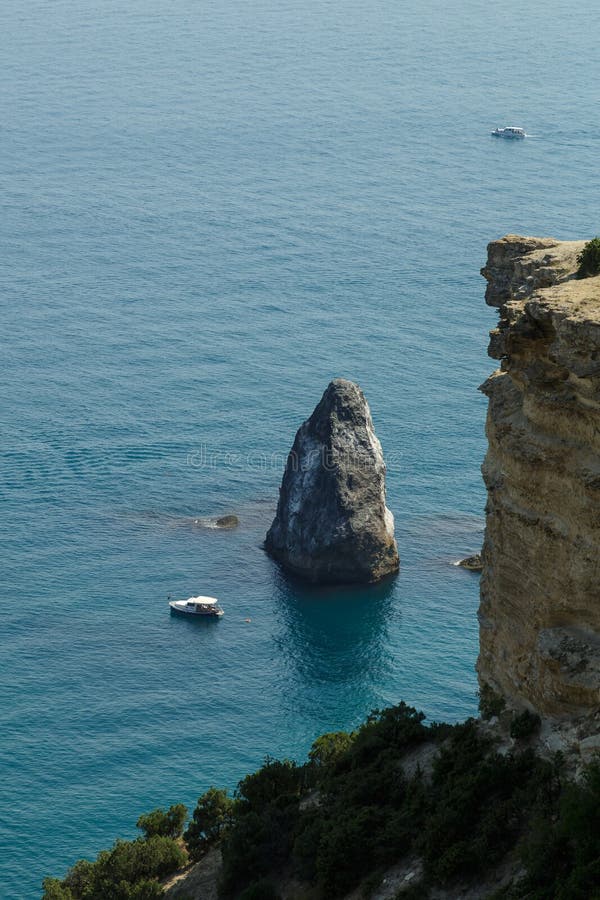 Beachfront Sharp Rocks stock photo. Image of season, holiday - 30526464