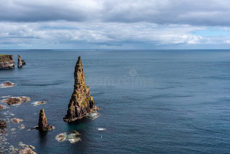 Sharp Rock Formations on the Coast of the Sea on a Gloomy Day Stock ...