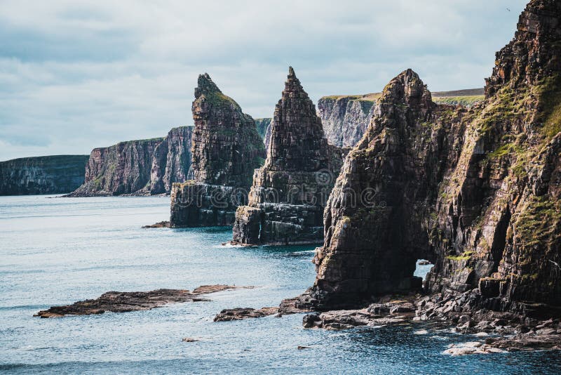 Sharp Rock Formations on the Coast of the Sea on a Gloomy Day Stock ...
