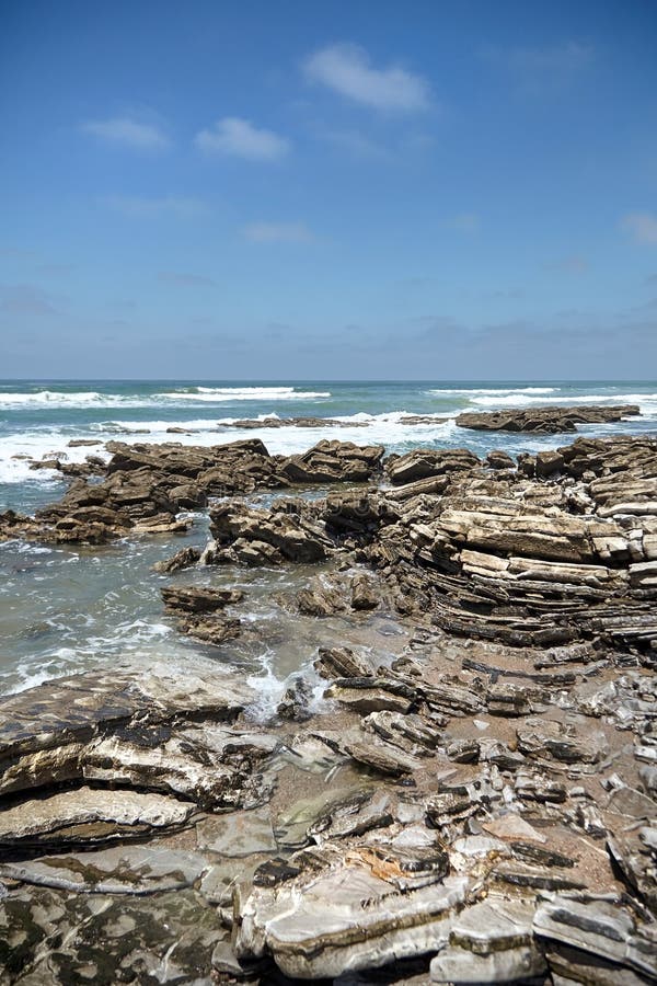 Sharp Rocks on Ocean Coast. Stones and Water Stock Photo - Image of ...
