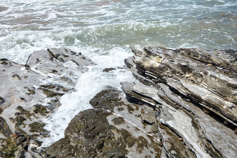 Sharp Rocks on Ocean Coast. Stones and Water Stock Photo - Image of ...
