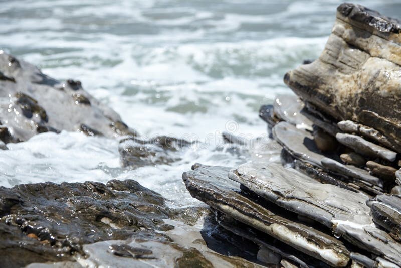 Sharp Rocks on Ocean Coast. Stones and Water Stock Image - Image of ...