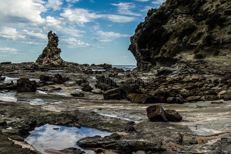 Sharp and Rough Cliff Rocks Emerging from the Water of the Australian ...