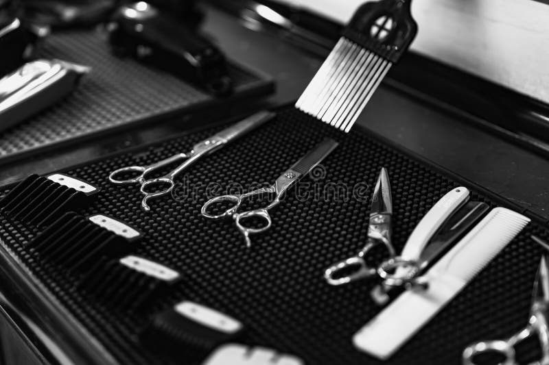 Sharp Scissors and Tools Set on Black Textured Surface in Barbershop ...