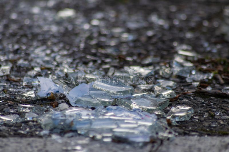 Sharp Shards of a Broken Glass Bottle on the Ground with Sharp Blades ...