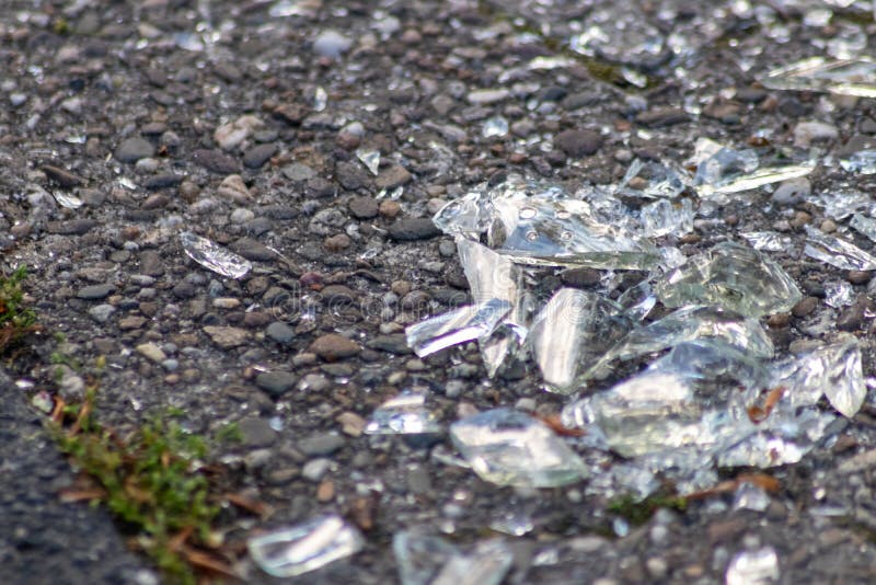 Sharp Shards of a Broken Glass Bottle on the Ground with Sharp Blades ...