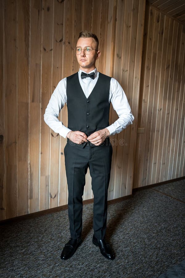 Sharp and Stylish Gentleman in Elegant Formal Attire Standing ...