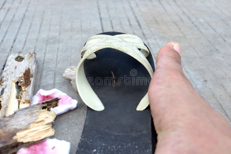 Sharp tack hurt foot stock photo. Image of boot, pace - 185157256